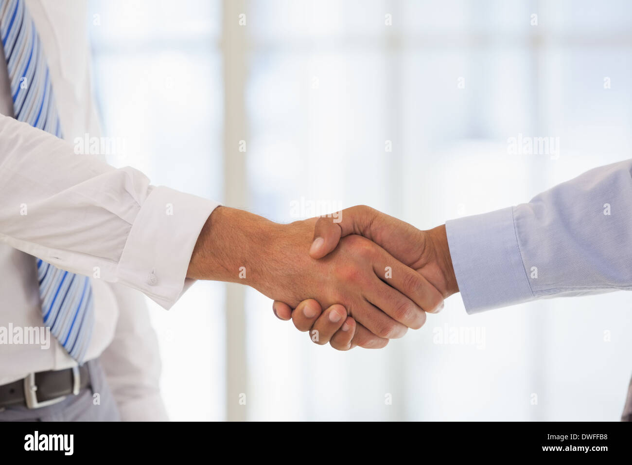 Close up handshake in office hi-res stock photography and images - Alamy