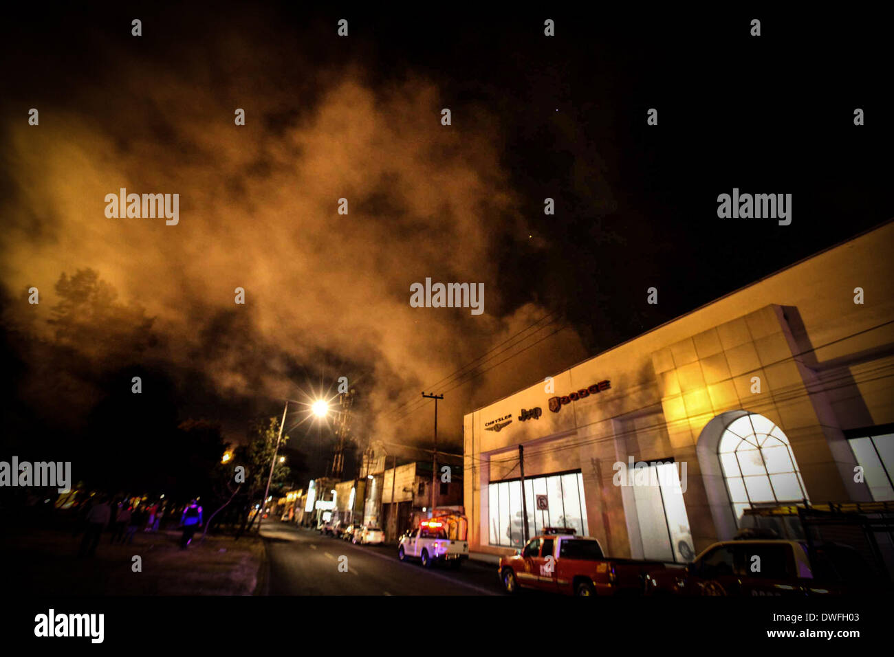 Mexico City, Mexico. 5th Mar, 2014. A car dealership caught fire in ...