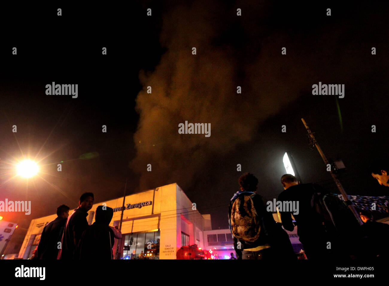 Mexico City, Mexico. 5th Mar, 2014. A car dealership caught fire in ...