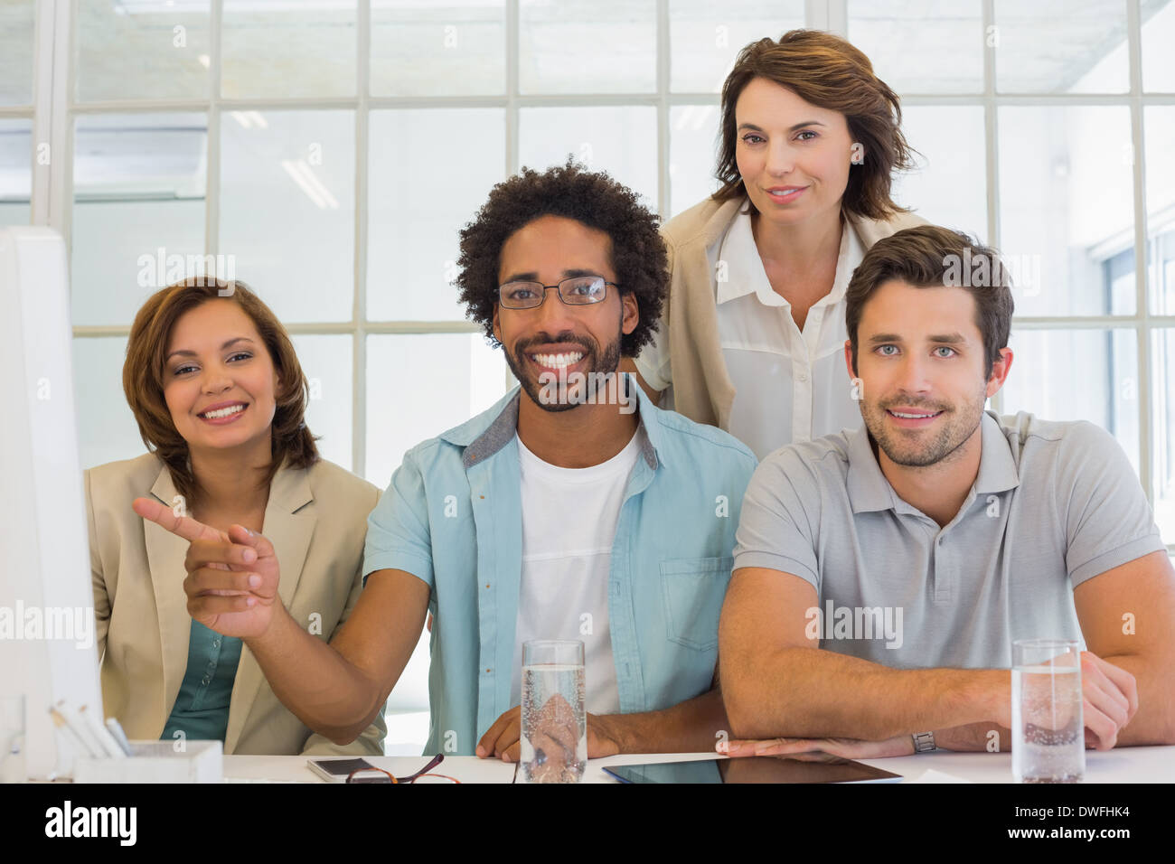 Business people with computer at office desk Stock Photo - Alamy