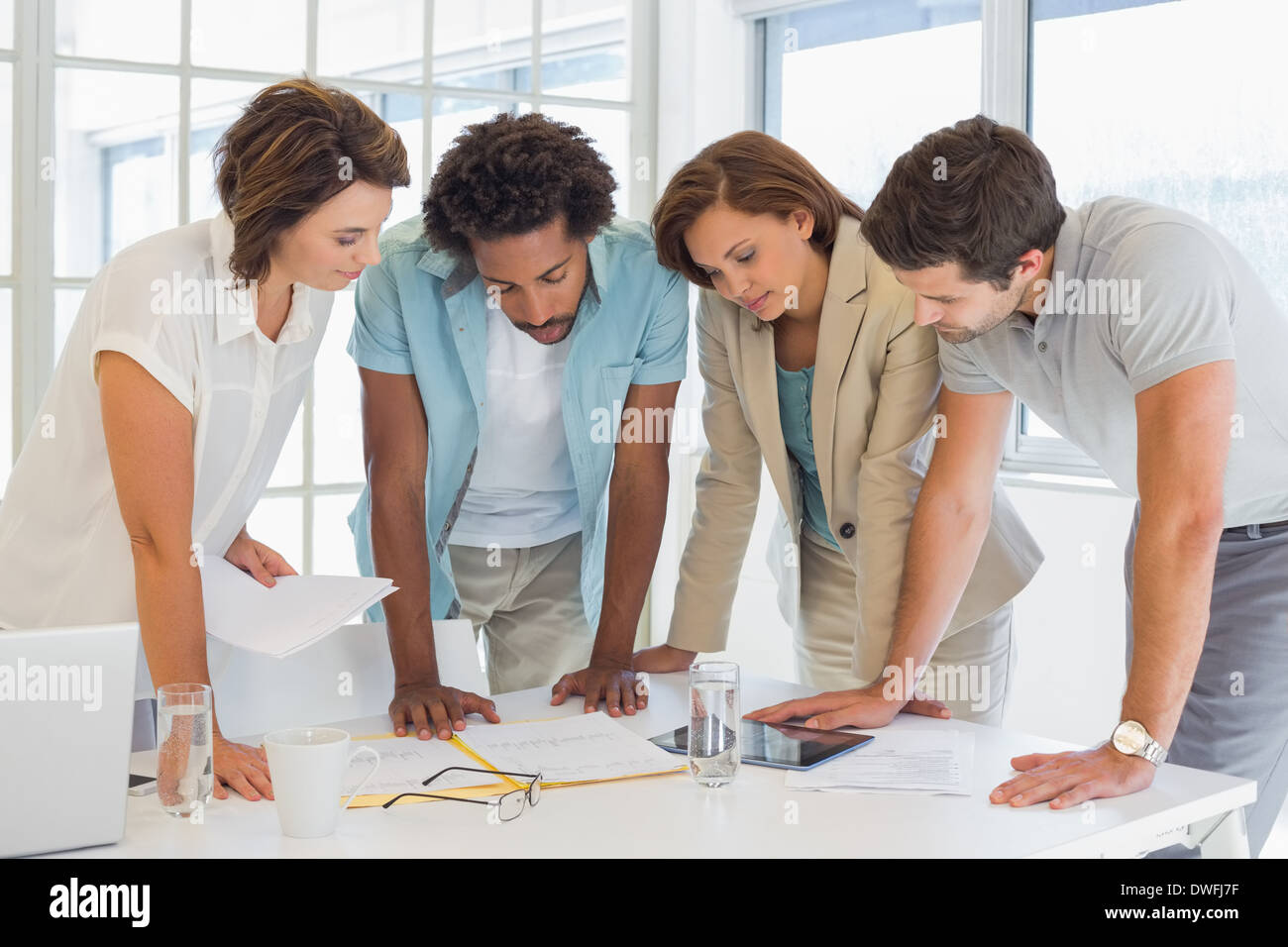 Concentrated business people in meeting Stock Photo - Alamy