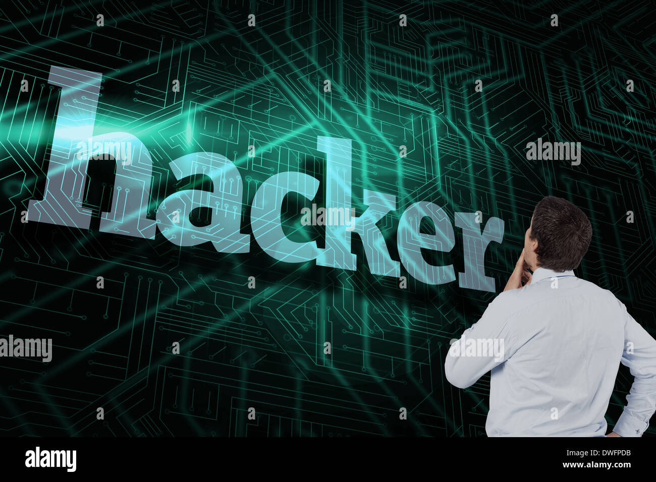 Hacker against green and black circuit board Stock Photo - Alamy