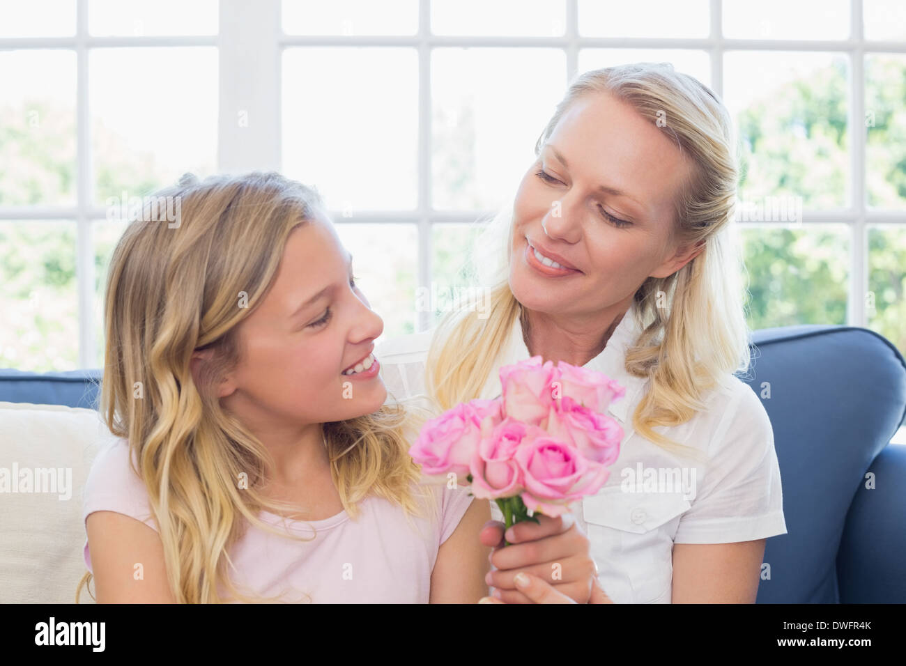 Woman giving bouquet flowers mother hi-res stock photography and images ...
