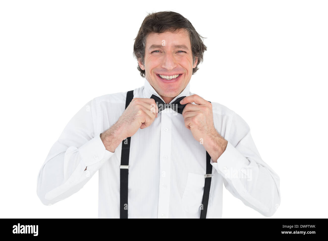 Man adjusting bow tie hi-res stock photography and images - Alamy