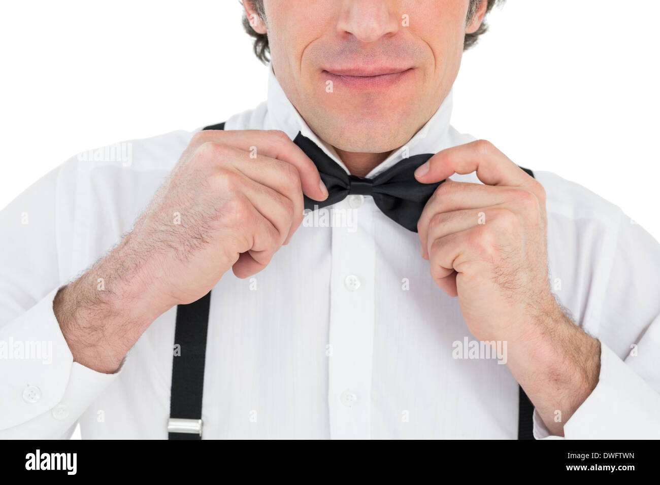 Man adjusting bow tie hi-res stock photography and images - Alamy