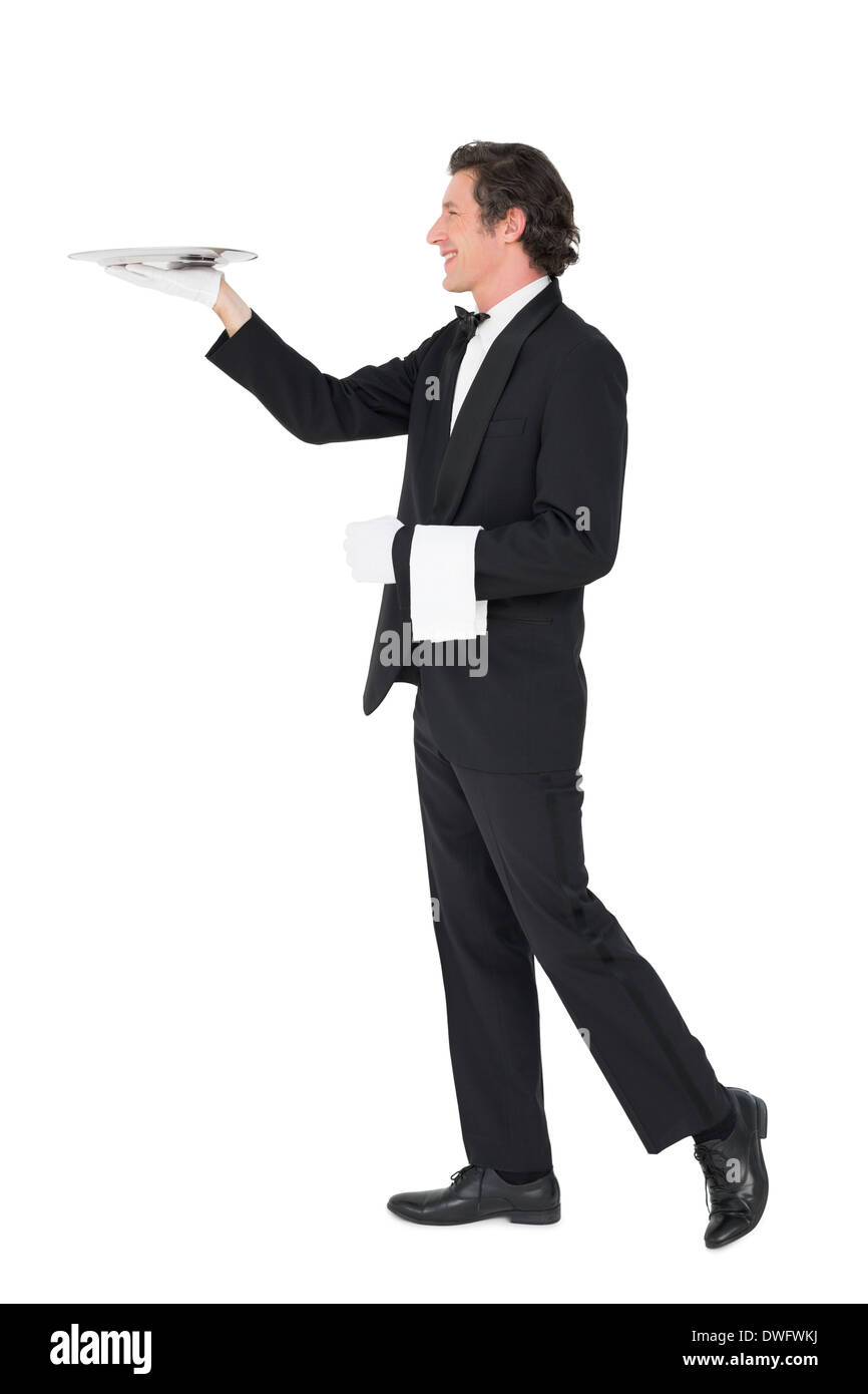 Waiter carrying tray over white background Stock Photo - Alamy Waiter carrying tray over white background Stock Photo - Alamy