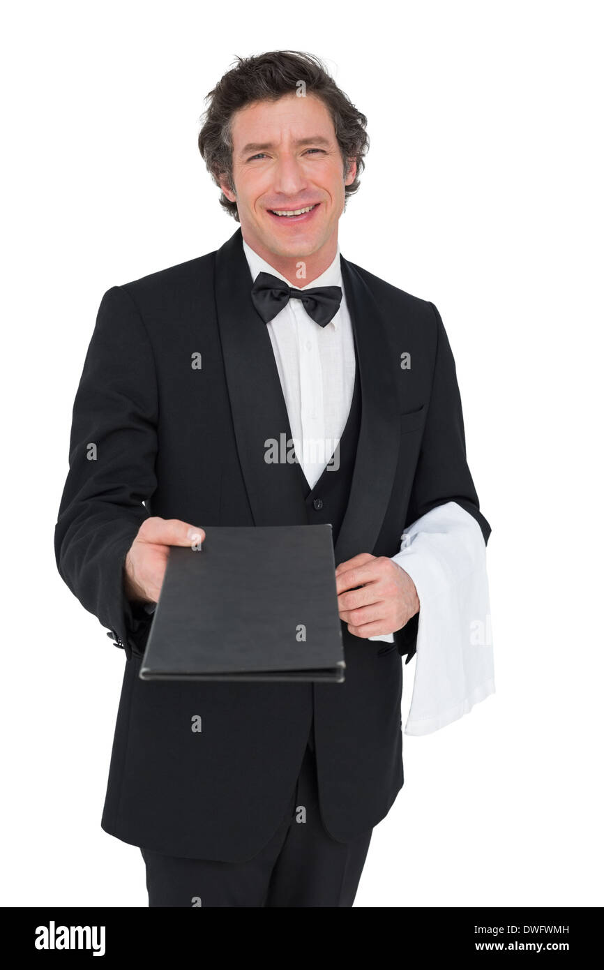Confident waiter giving bill pad over white background Stock Photo - Alamy