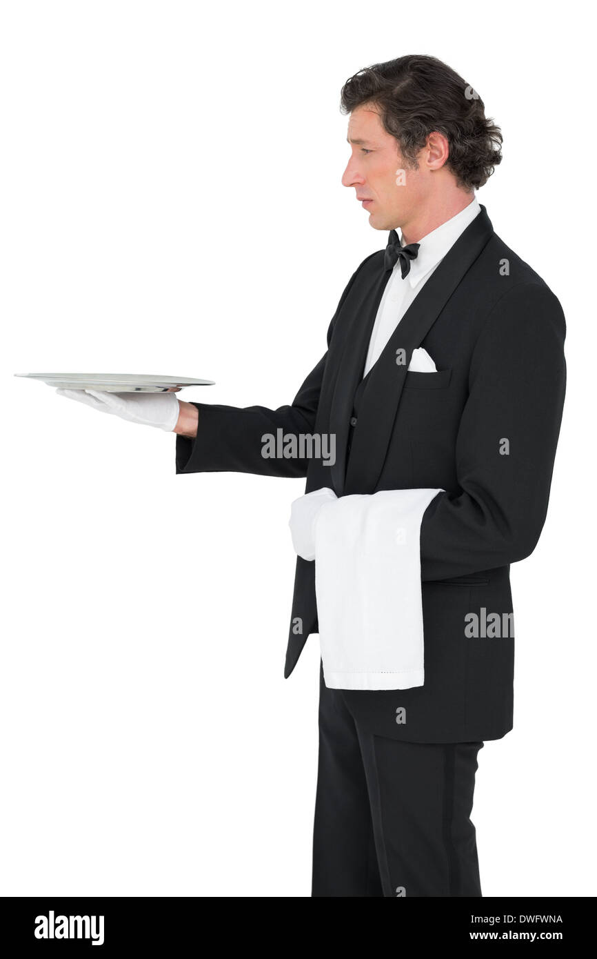 Server holding tray over white background Stock Photo - Alamy