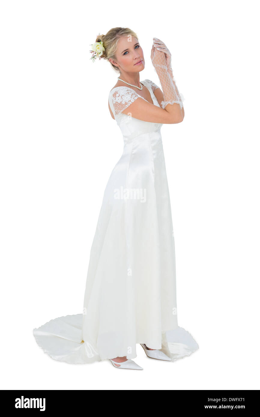 Beautiful bride posing over white background Stock Photo - Alamy