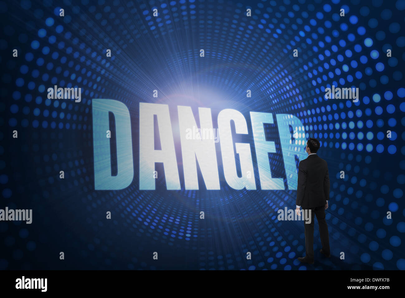 Danger against futuristic dotted blue and black background Stock Photo ...