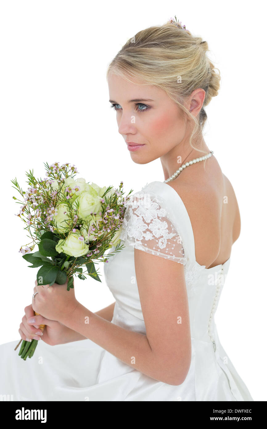 Bride holding flower hi-res stock photography and images - Alamy