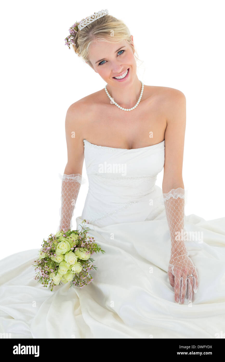 Confident bride holding rose bouquet hi-res stock photography and ...