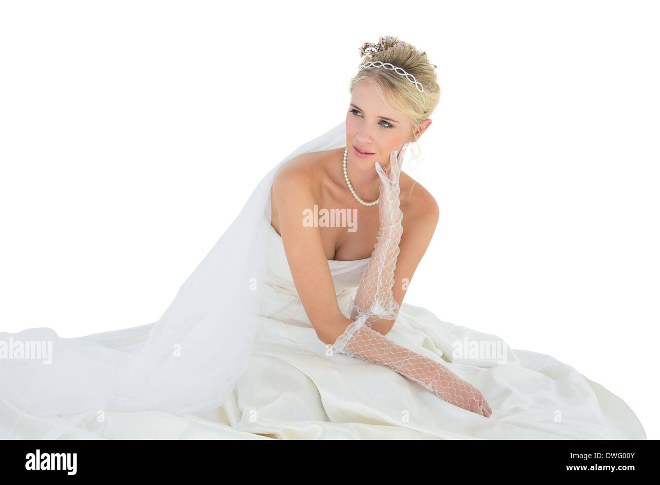 Thoughtful bride over white background Stock Photo - Alamy