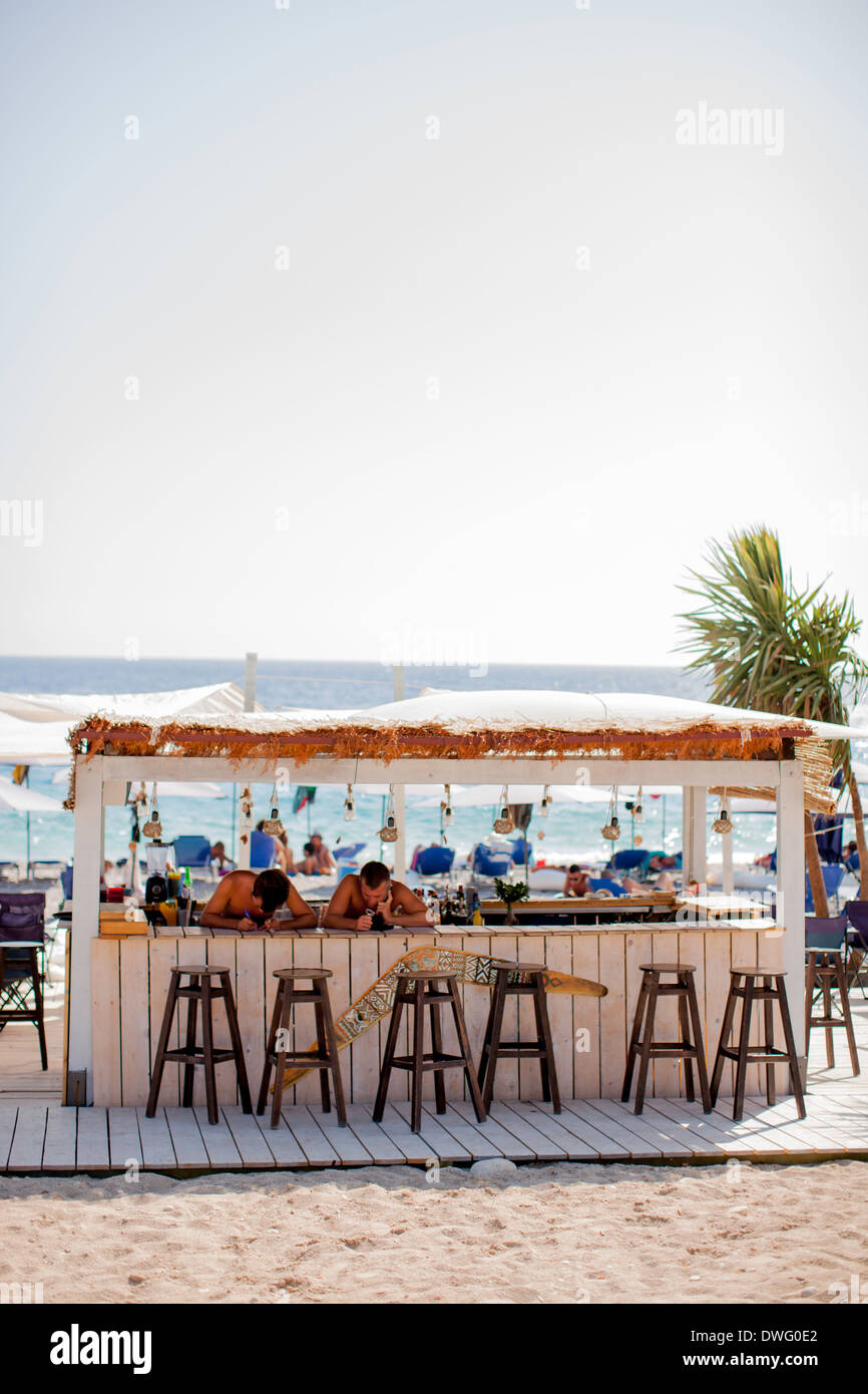 Beach bar on a summer day in Dhermi Stock Photo - Alamy