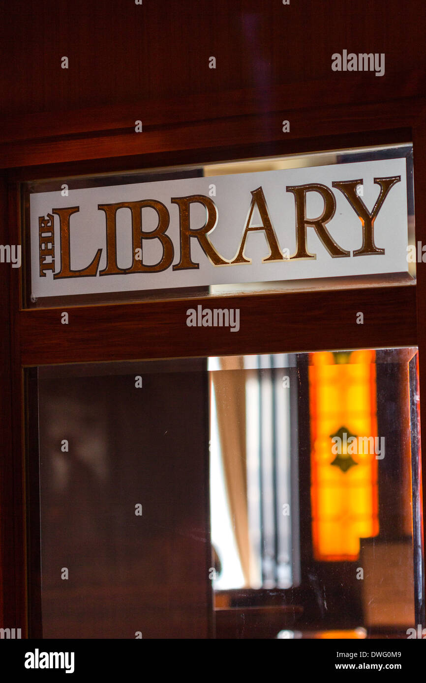 Sign "The Library" on Cunard Liner Queen Victoria Stock Photo - Alamy