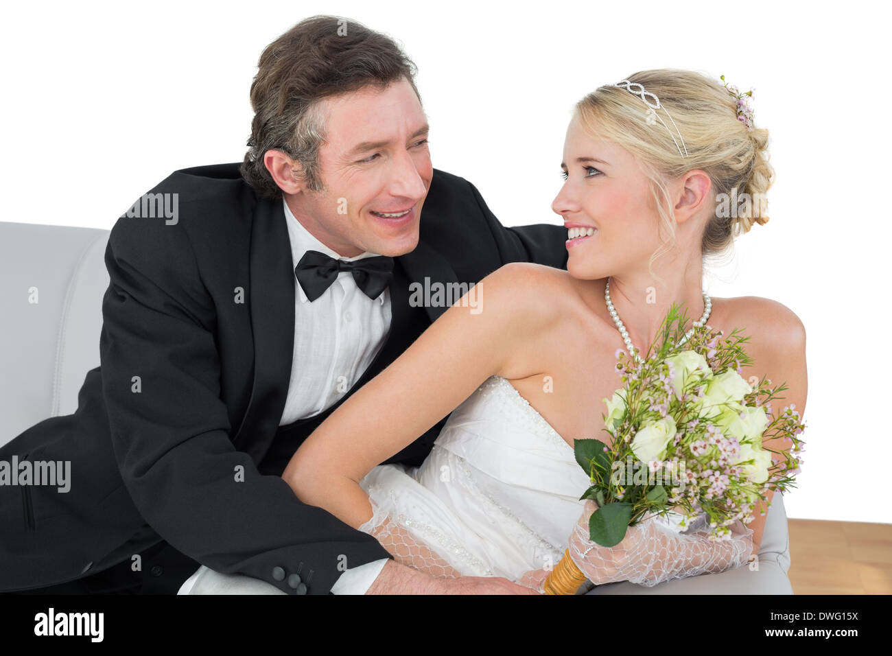Happy bride and groom looking at each other Stock Photo - Alamy