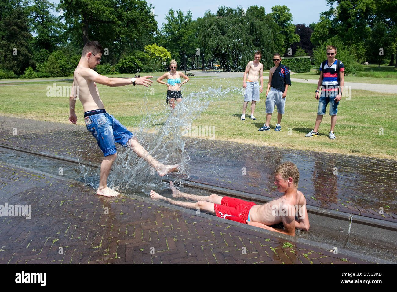 Young boys playing in a nature park hi-res stock photography and images ...