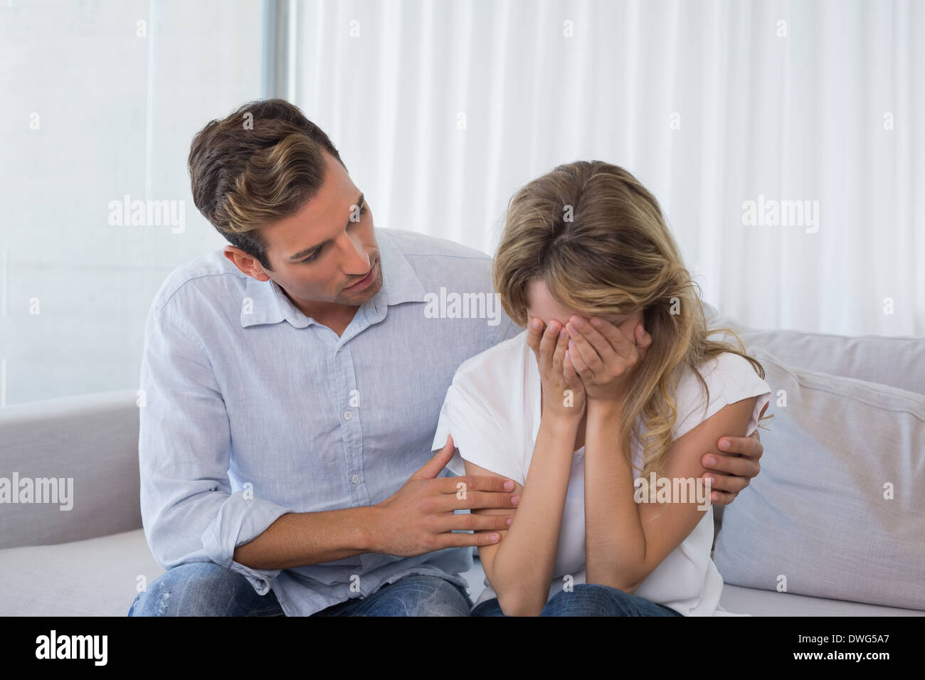 Man Consoling Sad Woman High Resolution Stock Photography and Images ...
