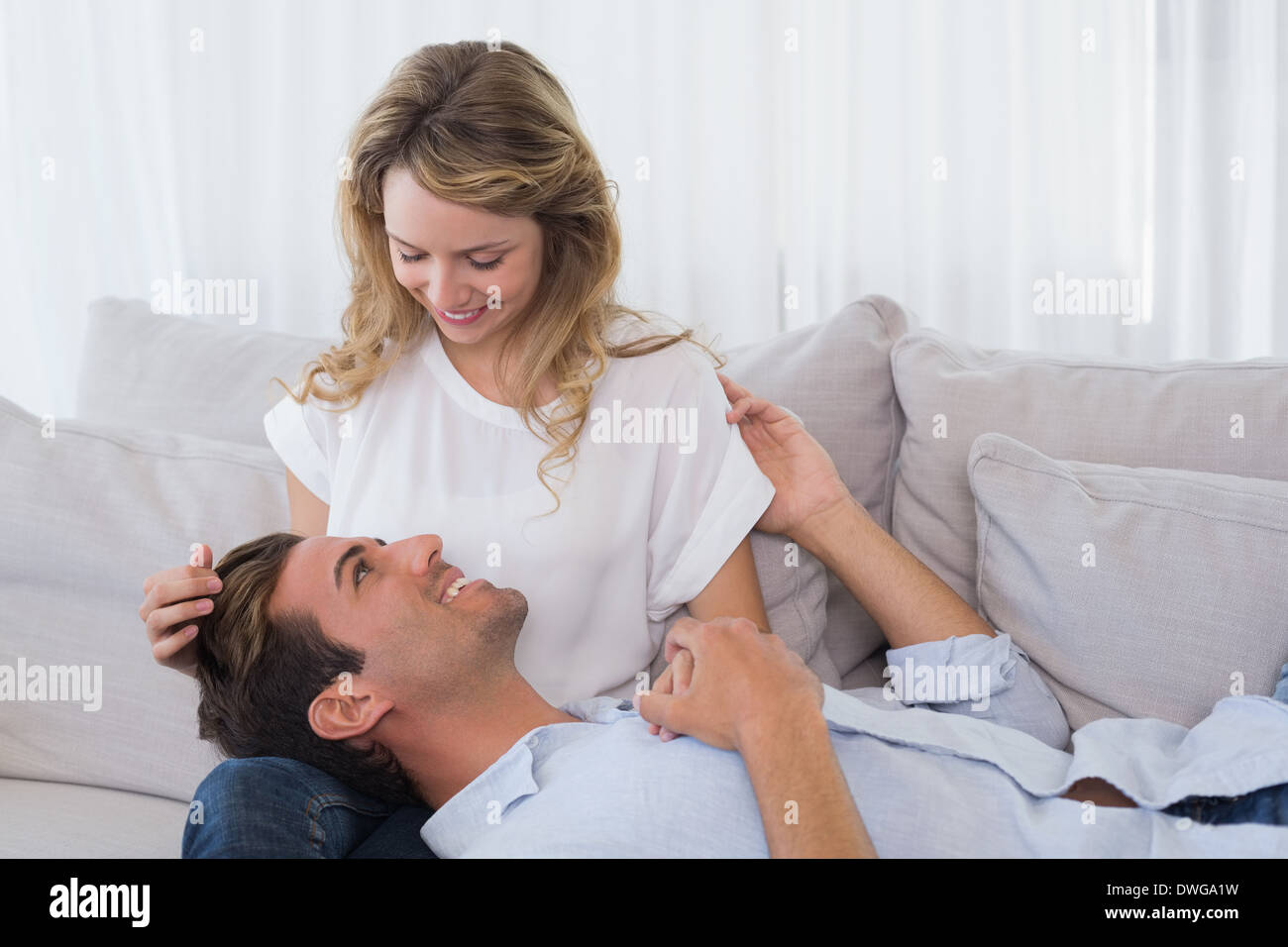Man on womans lap hi-res stock photography and images - Alamy