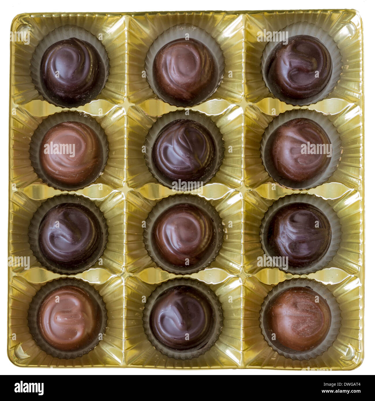 A square box of store bought chocolates Stock Photo - Alamy