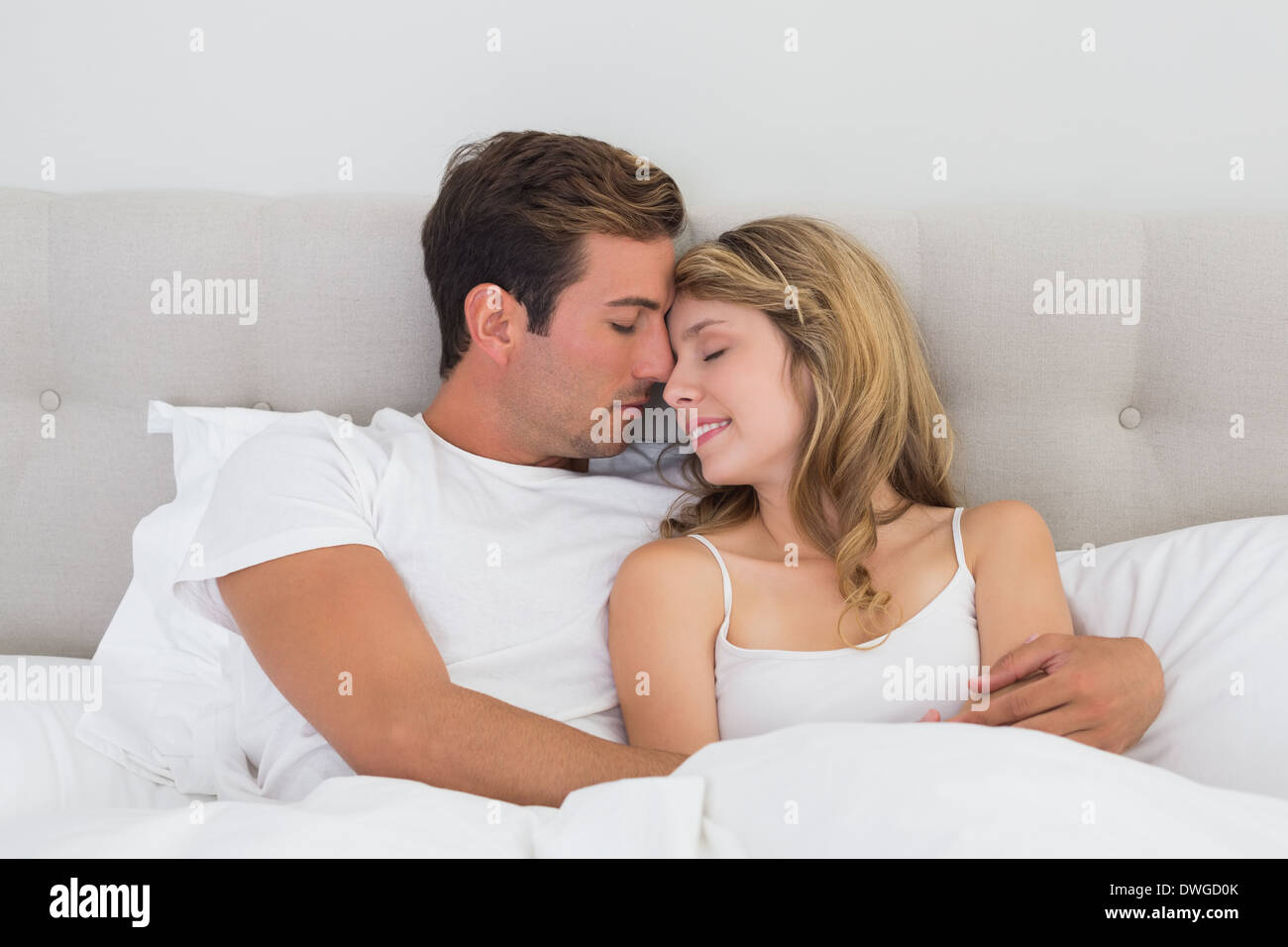 Couple in bed hi-res stock photography and images - Alamy