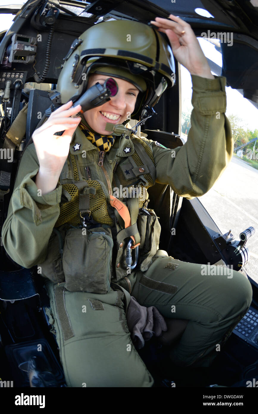 Italian military pilot in Mangusta helicopter cockpit Stock Photo - Alamy