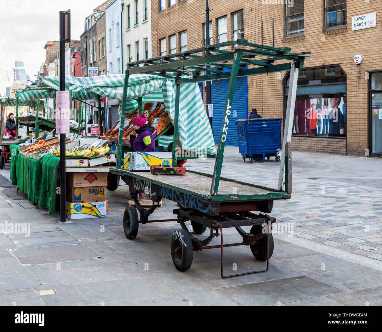 Fruit stall and empty trader's barrow at street Market in Lower Marsh ...
