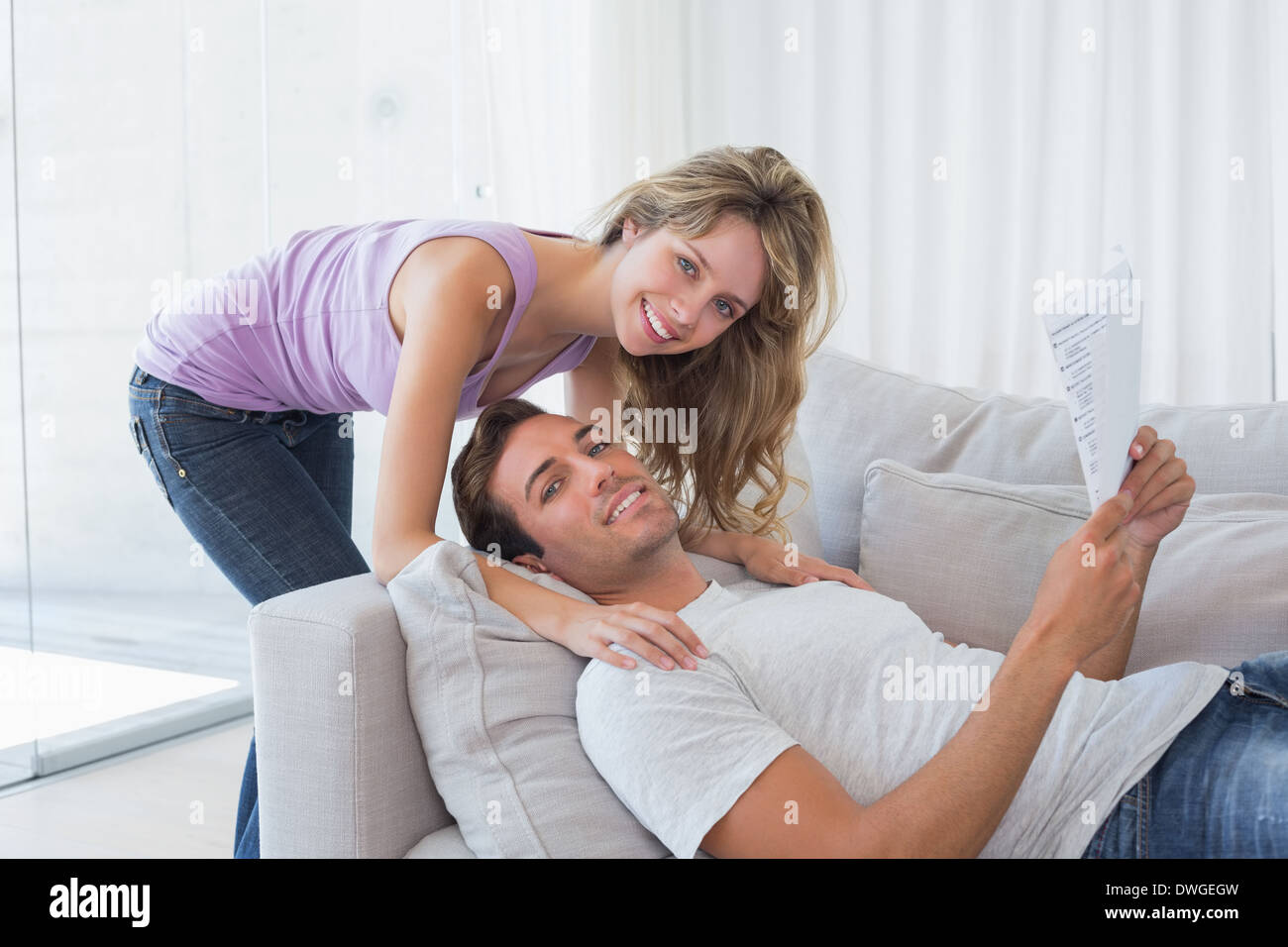 Beautiful couple reading document hi-res stock photography and images ...