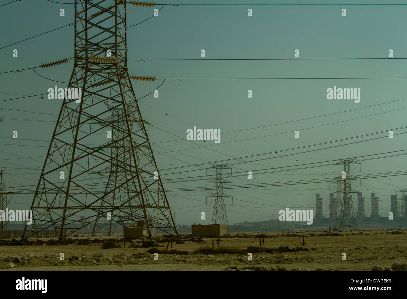 Electricity Pylons in desert Qatar Middle East Stock Photo - Alamy