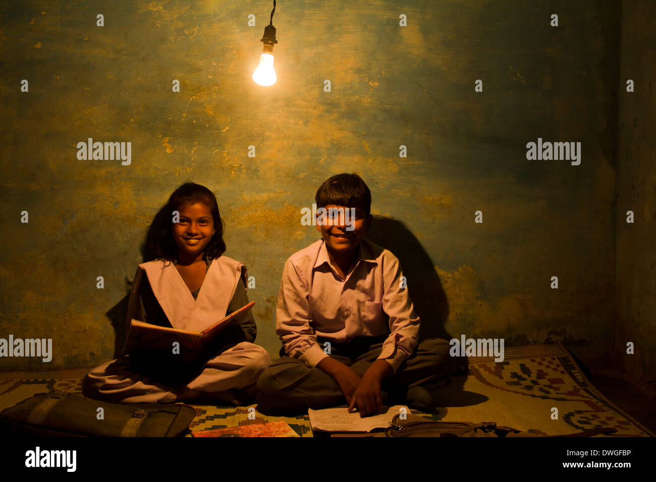 Poor kid studying in dark hi-res stock photography and images - Alamy