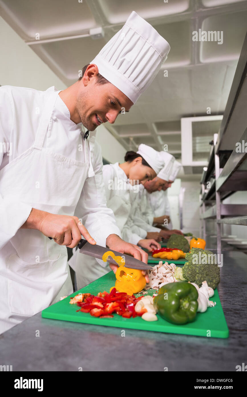 Chefs slicing vegetables hi-res stock photography and images - Alamy