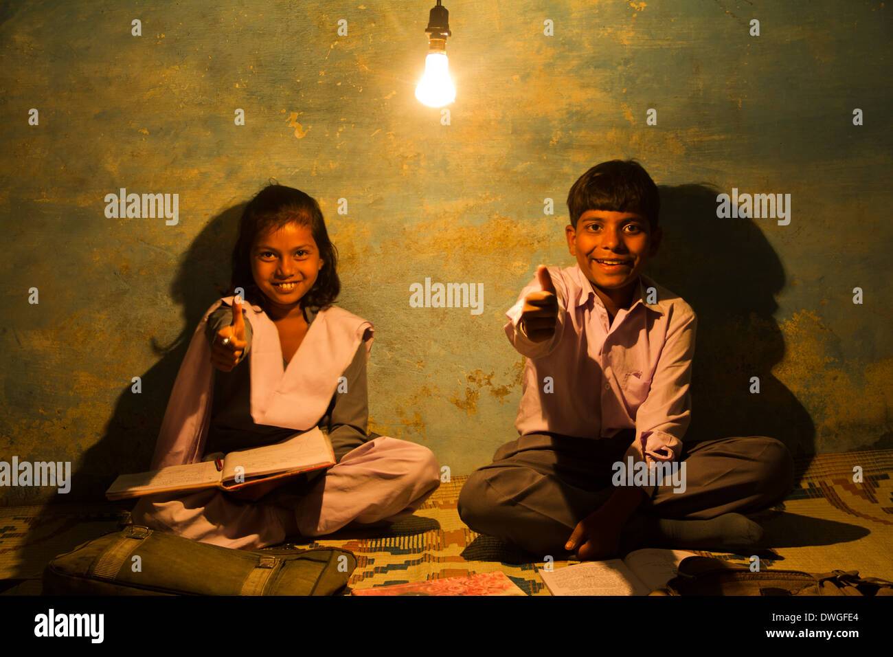 Poor kid studying in dark hi-res stock photography and images - Alamy