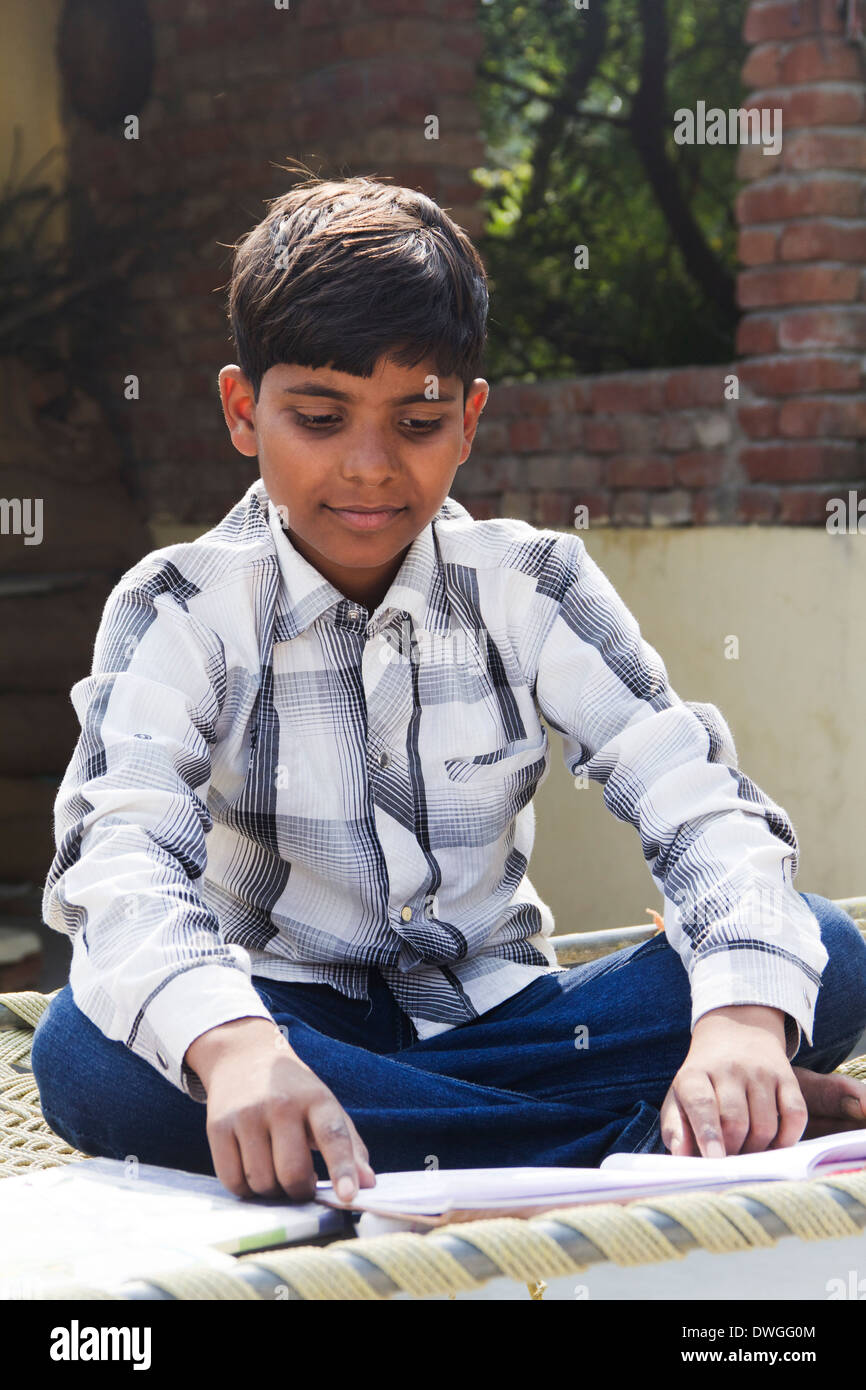 1 Indian rural student reading at home Stock Photo - Alamy