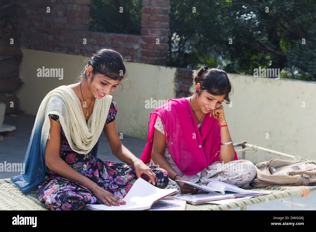 Indian rural student reading at home Stock Photo - Alamy