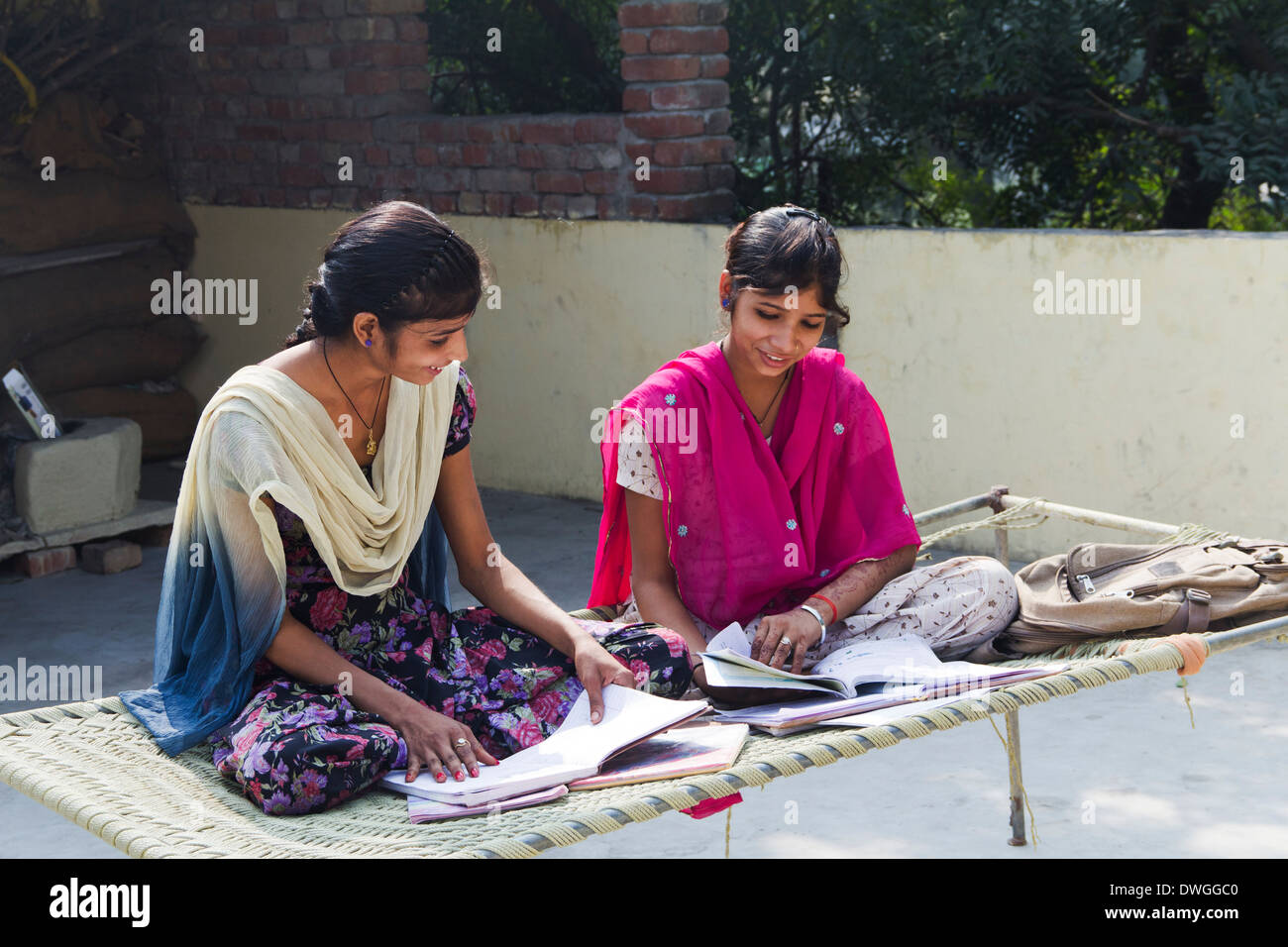 Indian rural student reading at home Stock Photo - Alamy