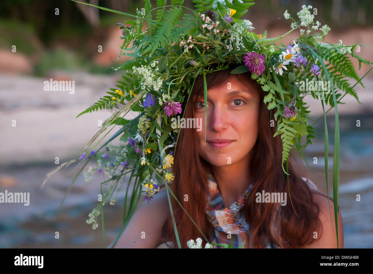 Beautiful Girl with summer bouquet and summer wreath of grass and ...