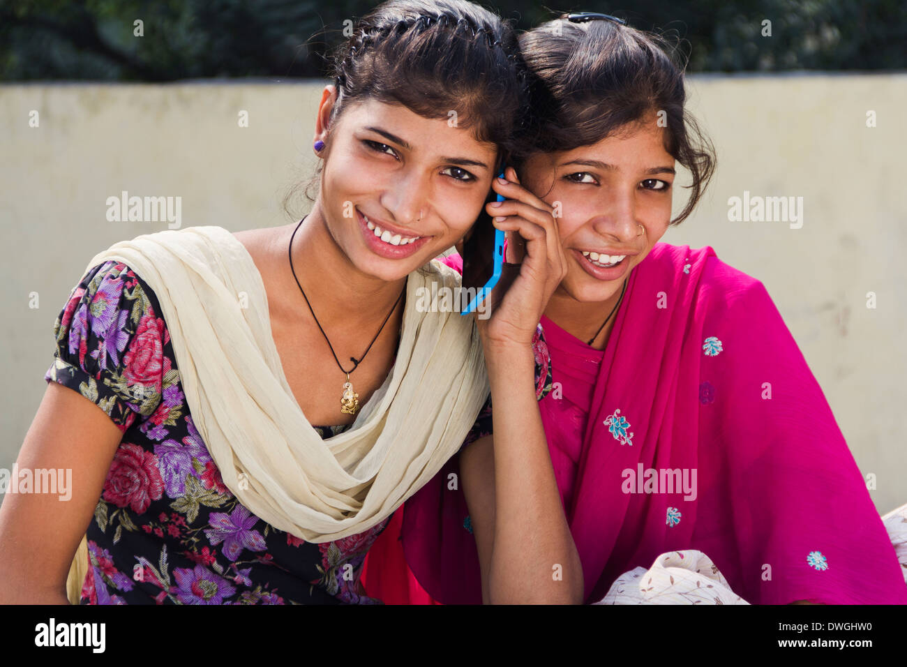 Indian Rural girls talking with mobile phone Stock Photo - Alamy