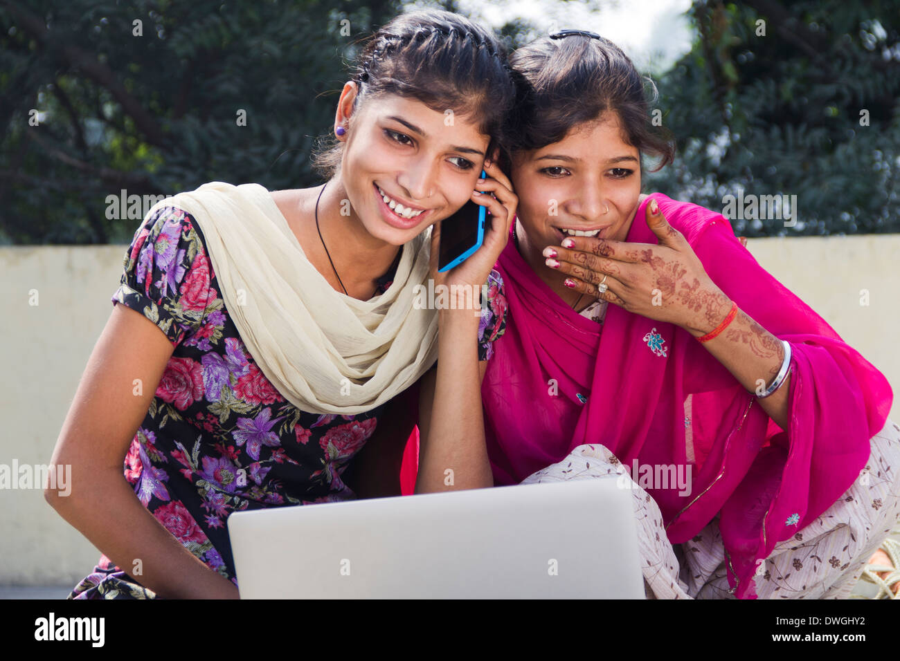 Indian Rural girls talking with mobile phone Stock Photo - Alamy