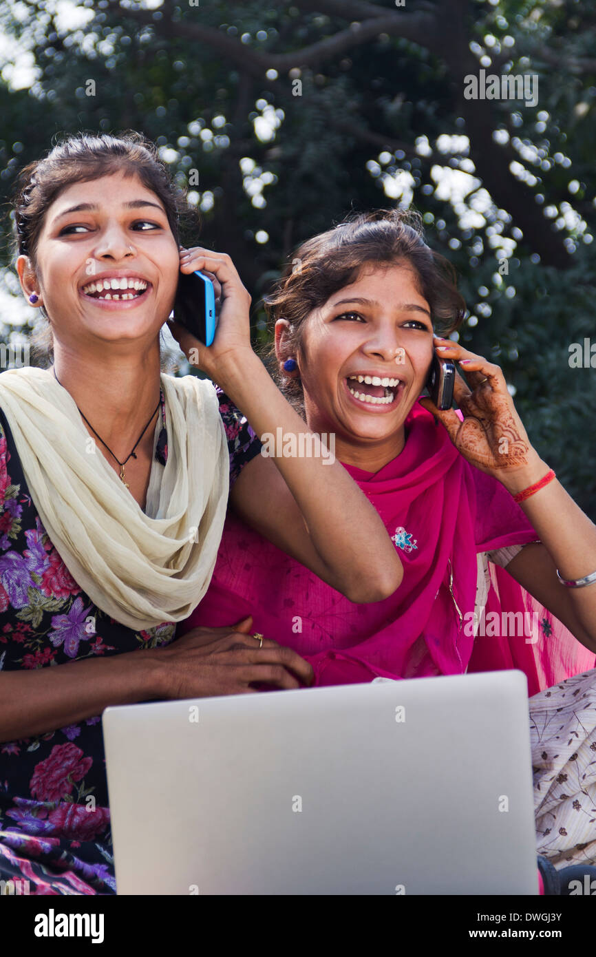 Indian Rural girls talking with mobile phone Stock Photo - Alamy