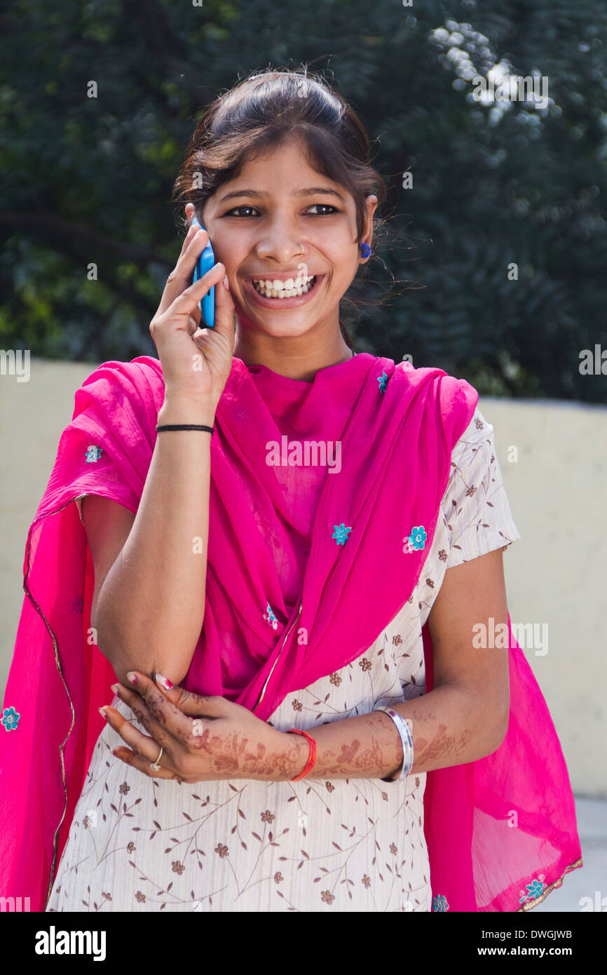 Indian rural girls talking mobile hi-res stock photography and images ...