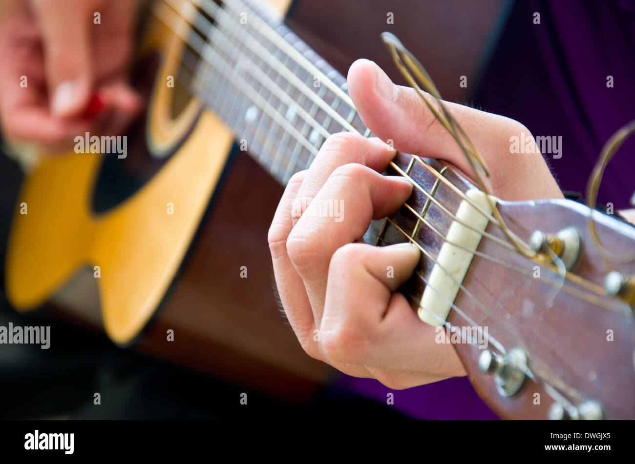 Hand play guitar hi-res stock photography and images - Alamy