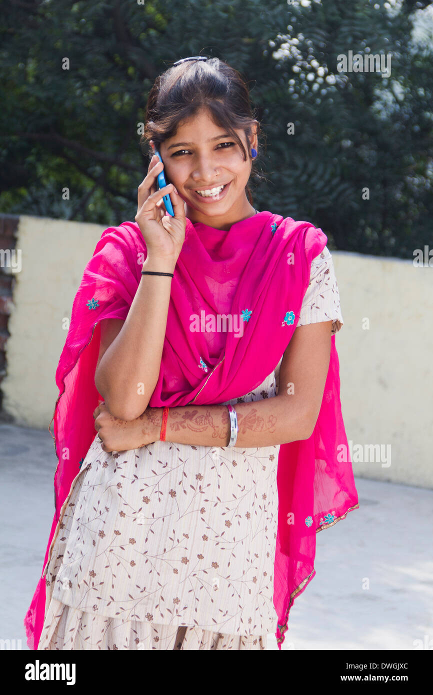 1 Indian Rural girl talking with mobile phone Stock Photo - Alamy