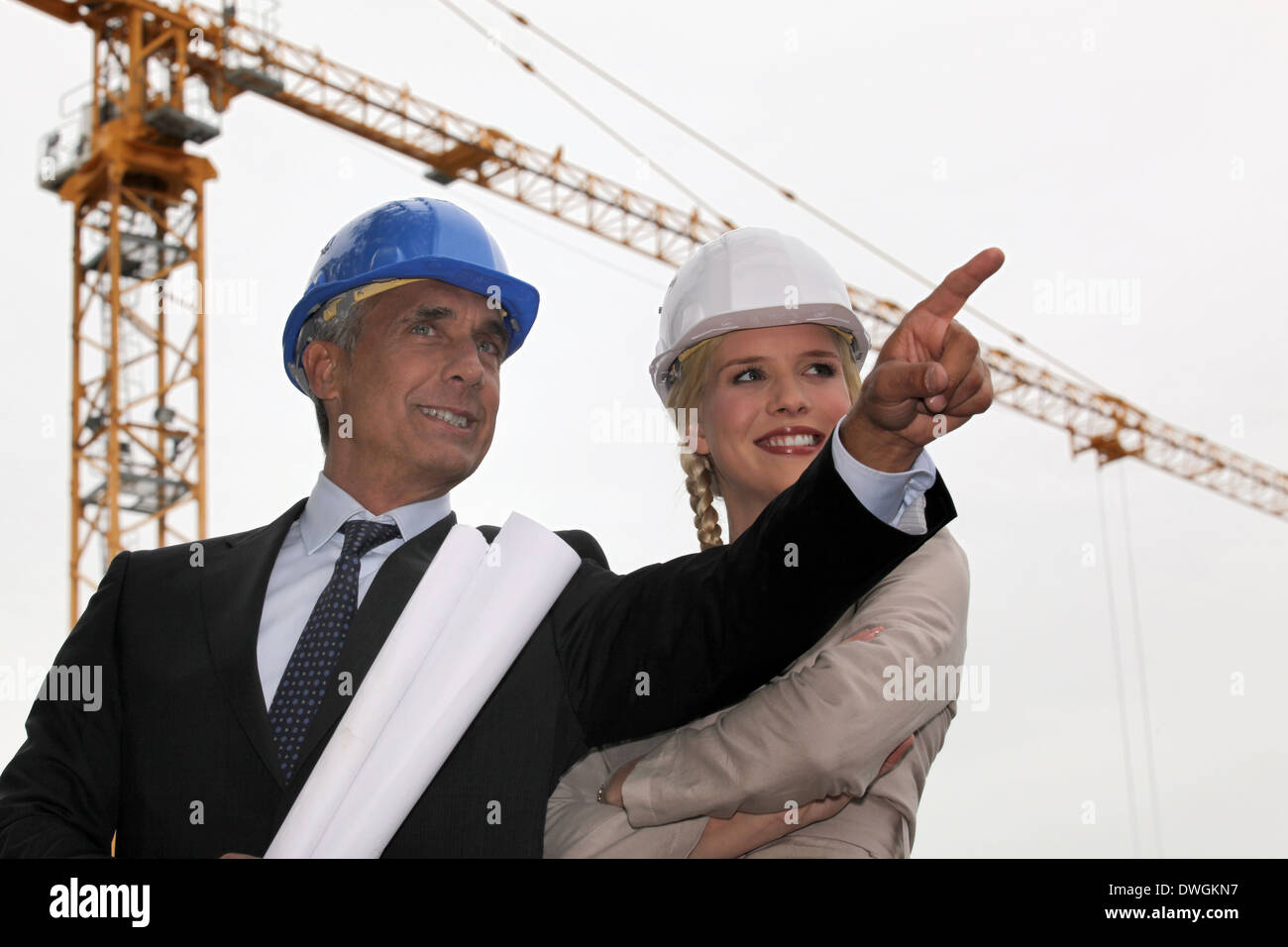 Architect and assistant happy with progress Stock Photo - Alamy