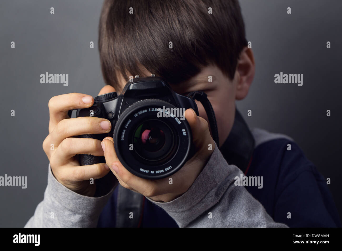 Boy dslr hi-res stock photography and images - Alamy