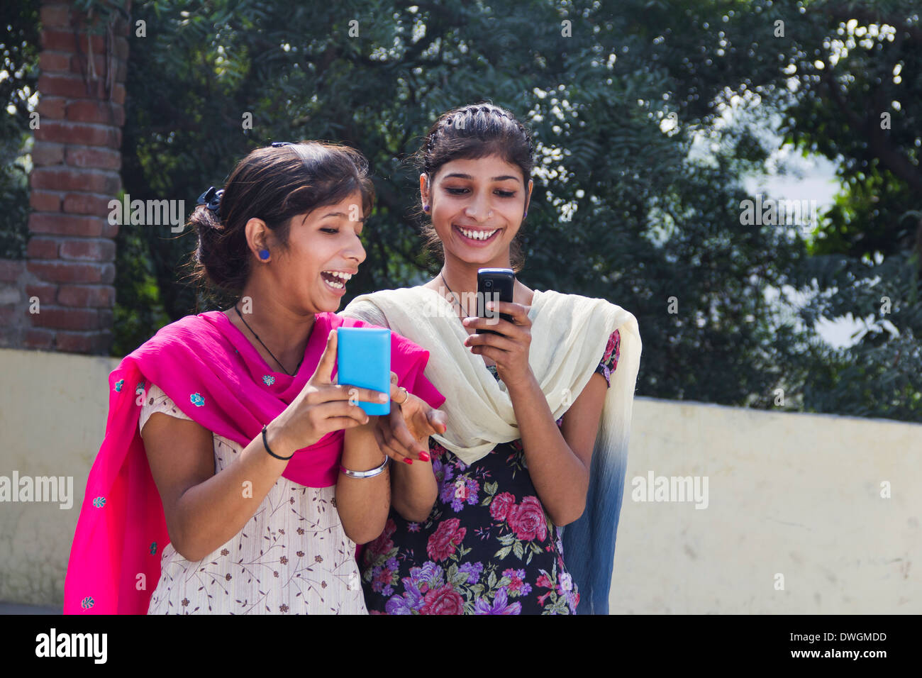 Indian Rural girls talking with mobile phone Stock Photo - Alamy