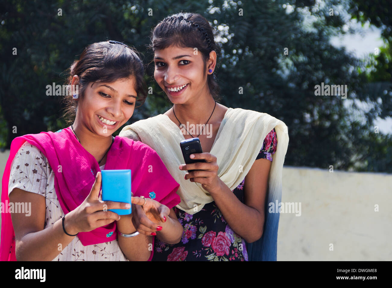 Indian Rural girls talking with mobile phone Stock Photo - Alamy
