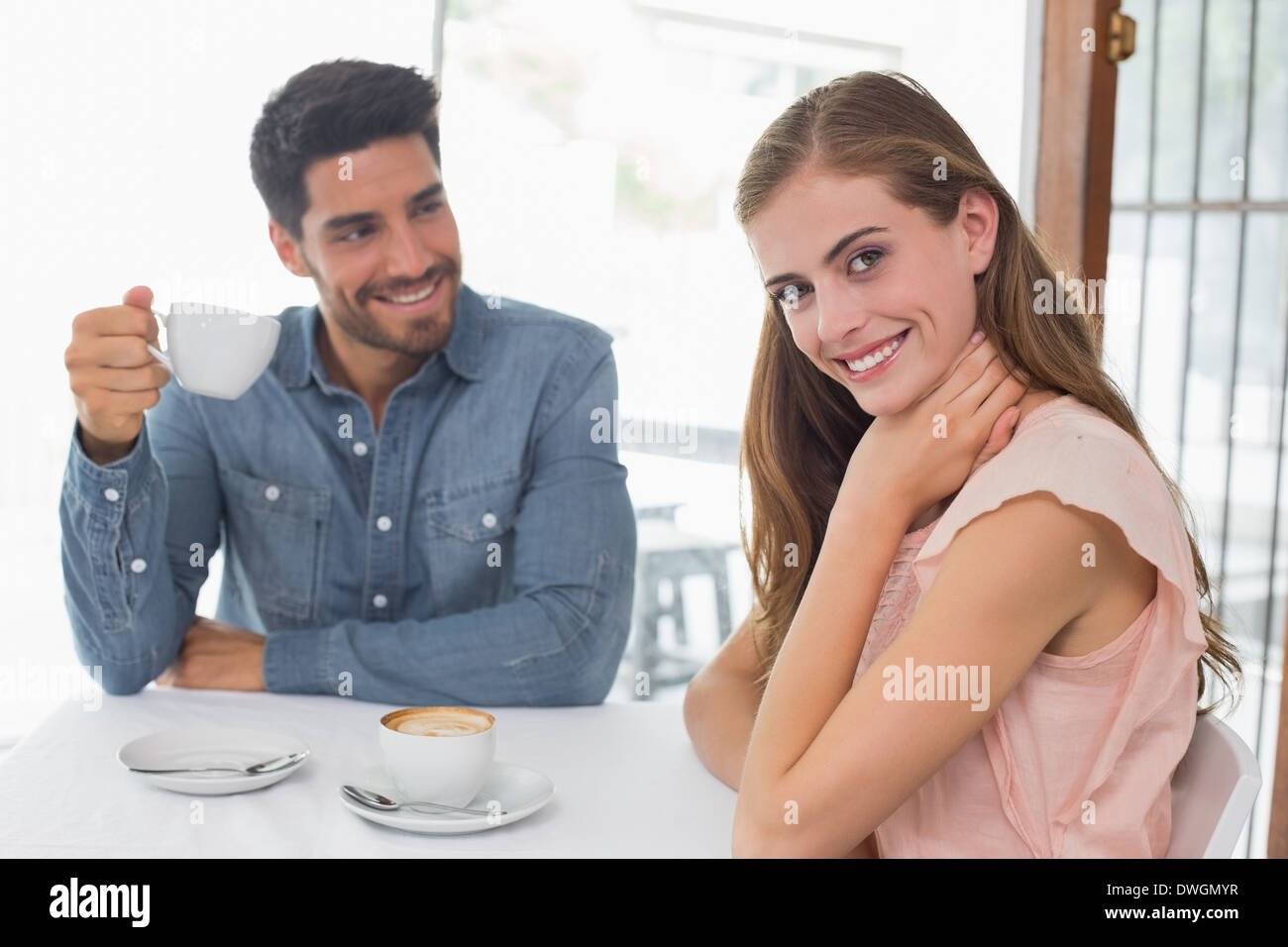 Smiling couple coffee shop hi-res stock photography and images - Alamy