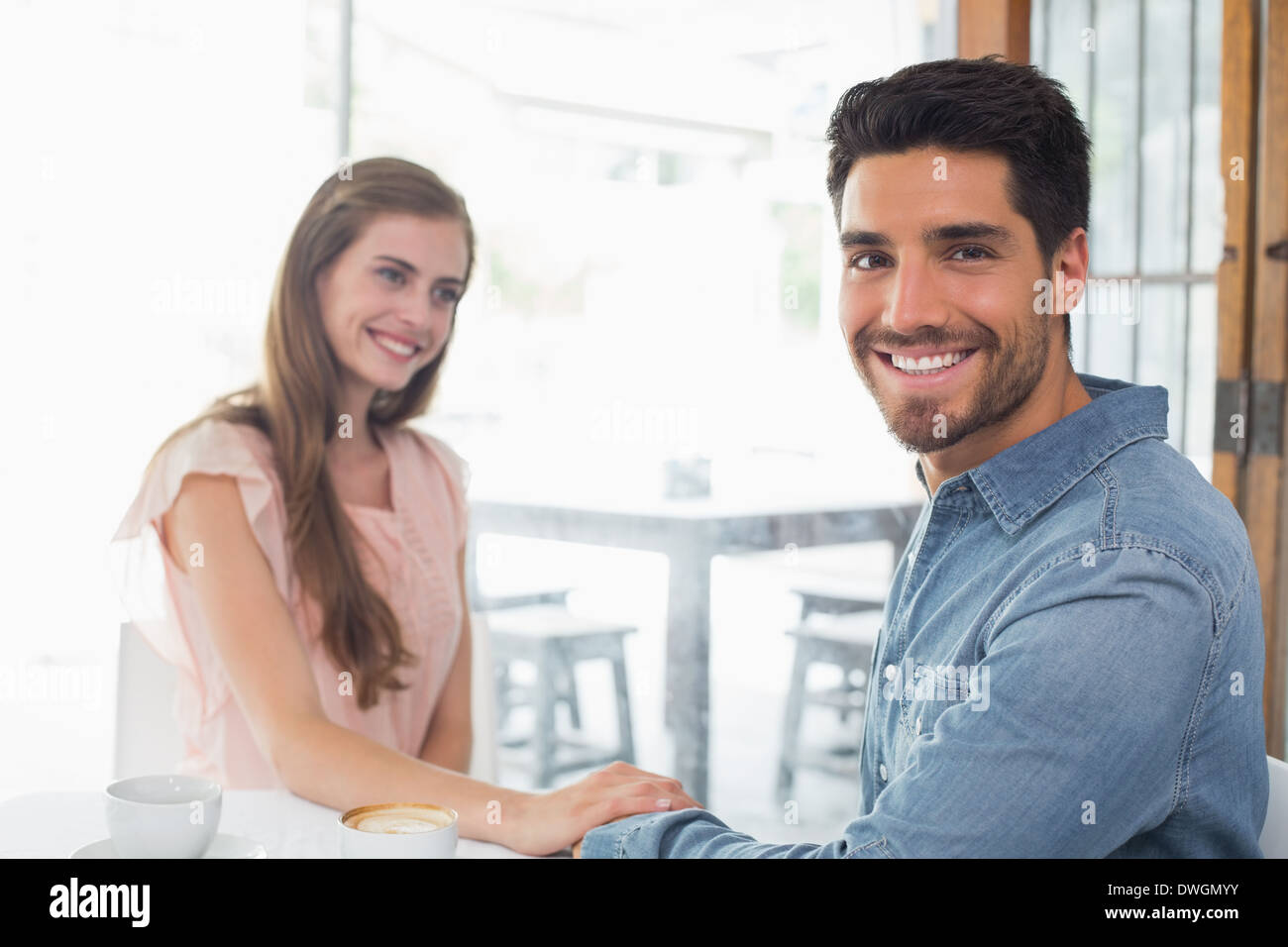 Romantic couple at coffee shop Stock Photo - Alamy