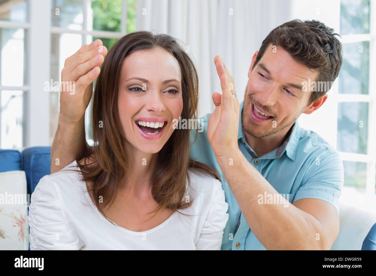Man and woman in beautiful living room hi-res stock photography and ...