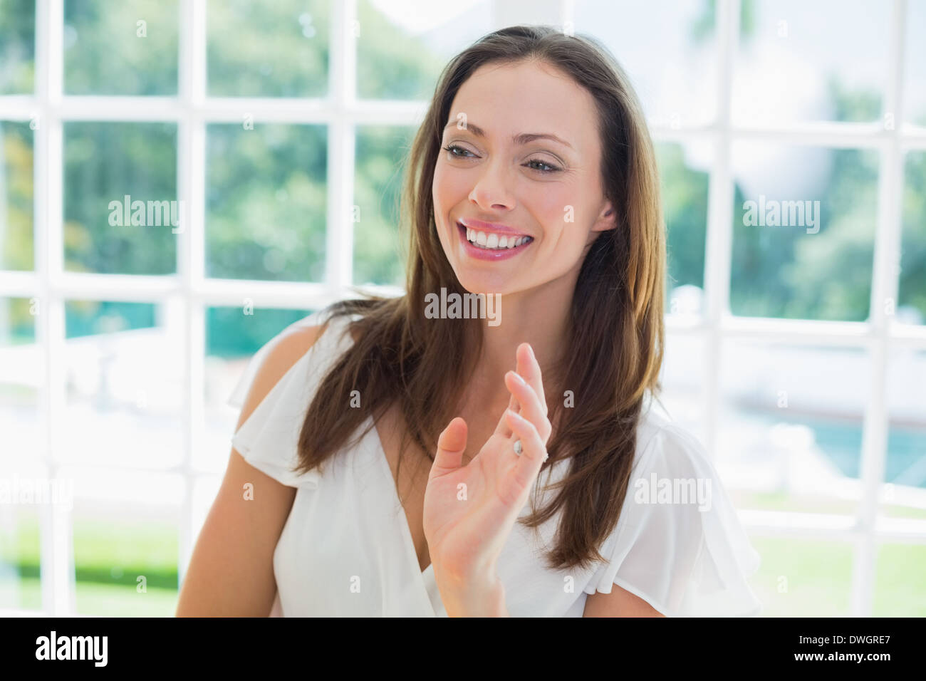 Woman waving hi-res stock photography and images - Alamy